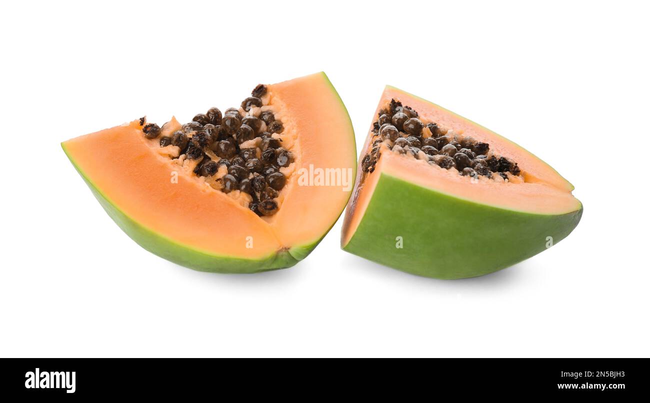 Fresh ripe papaya pieces on white background Stock Photo - Alamy