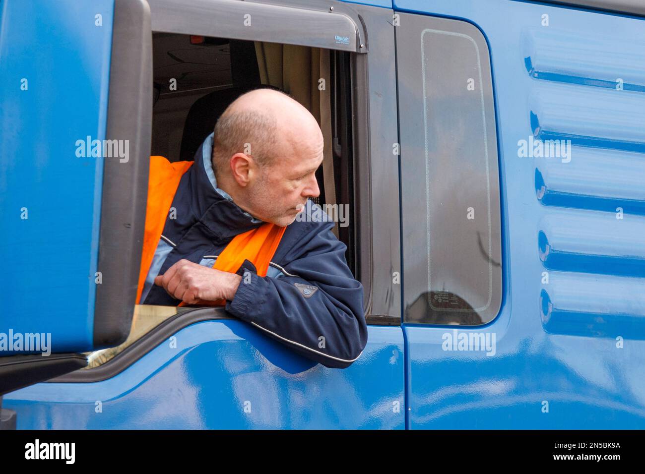 Professional driver when manoeuvring, reversing, truck in long-distance ...