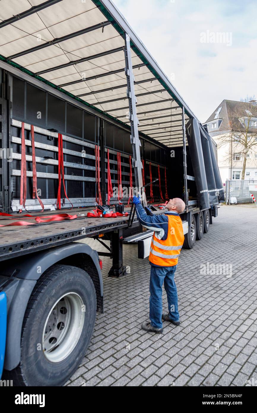 Freight transport, professional drivers in the loading zone, loading ...