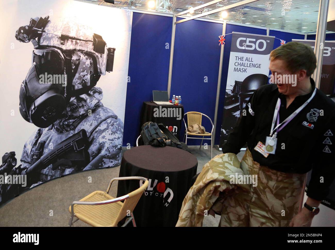 People visit a weapons exhibition organized by the Iraqi defense ...