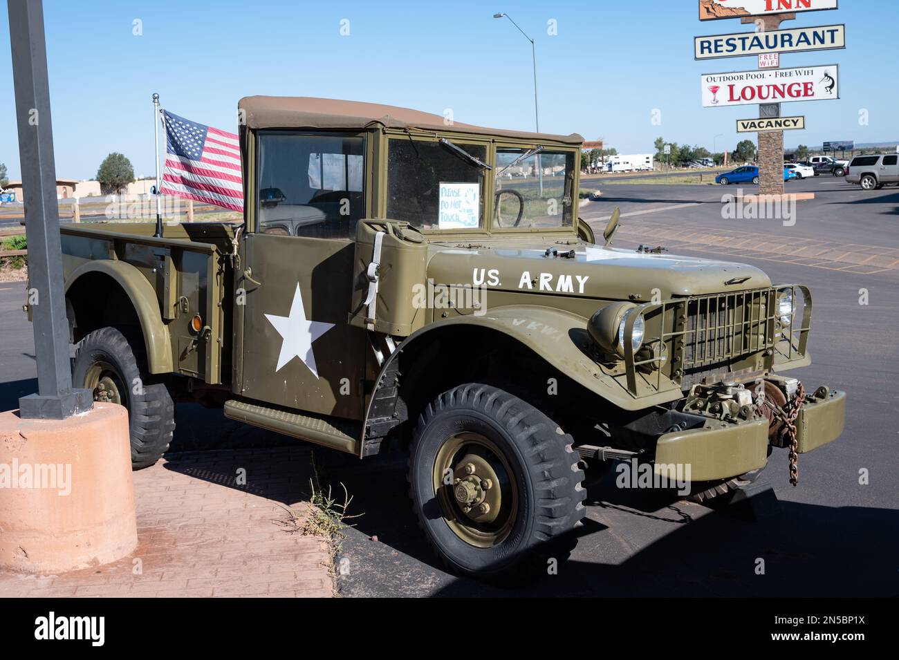 An old green Dodge M37 pickup military truck with the white star of the ...