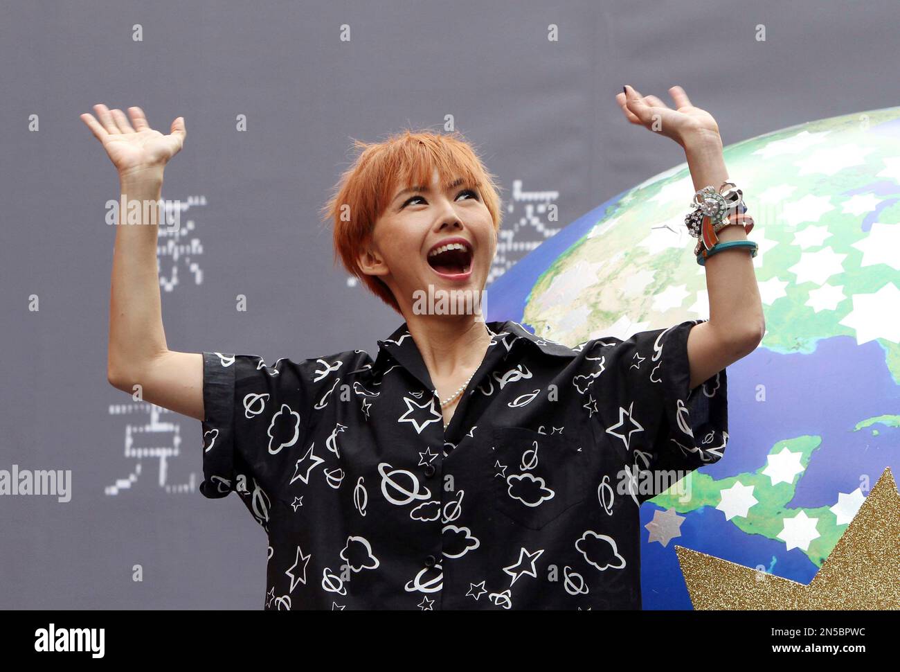 Singapore singer Stefanie Sun smiles during a media event to promo her ...