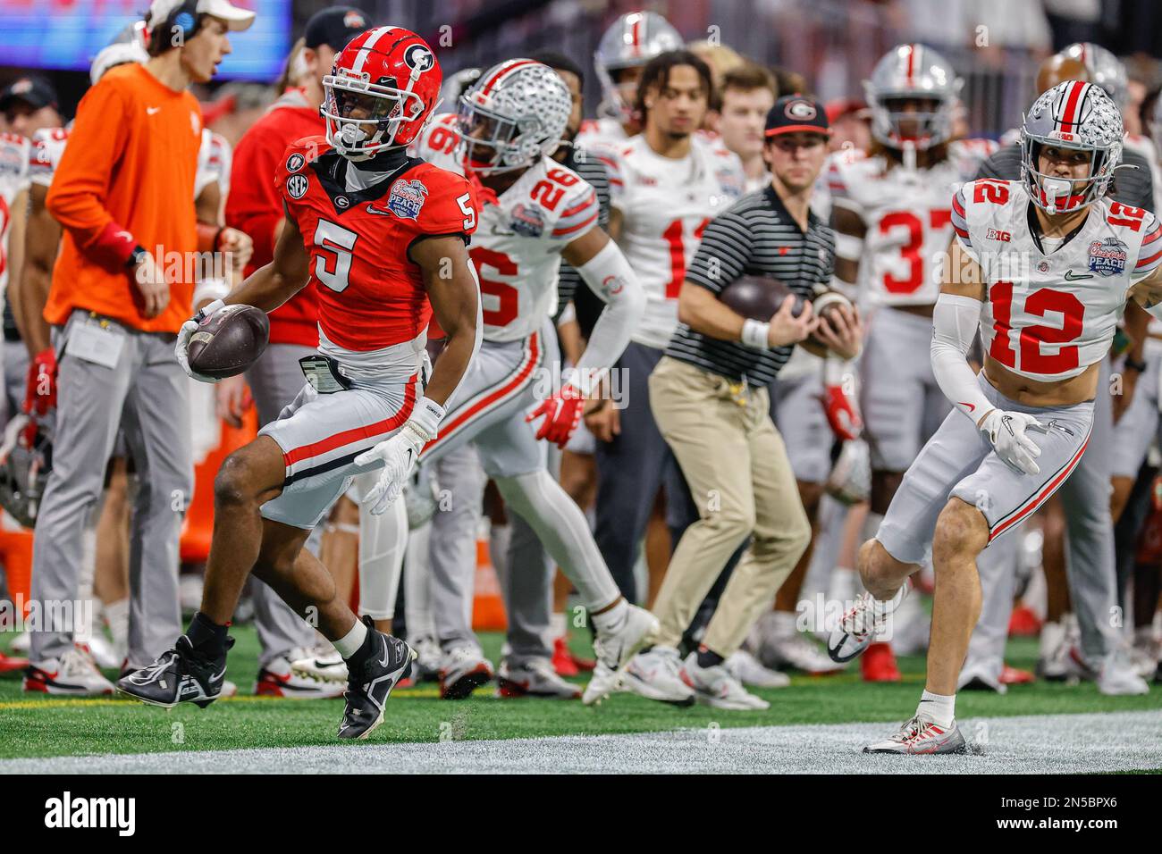 December 31, 2022: Georgia's Adonai Mitchell (5) is taken out of bounds ...