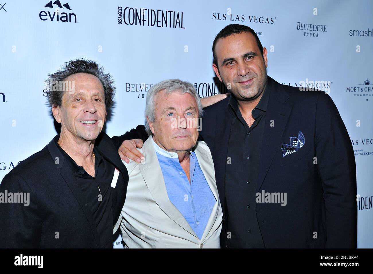 Producer Brian Grazer (L) photographer Terry O'Neill (C) and Sam ...