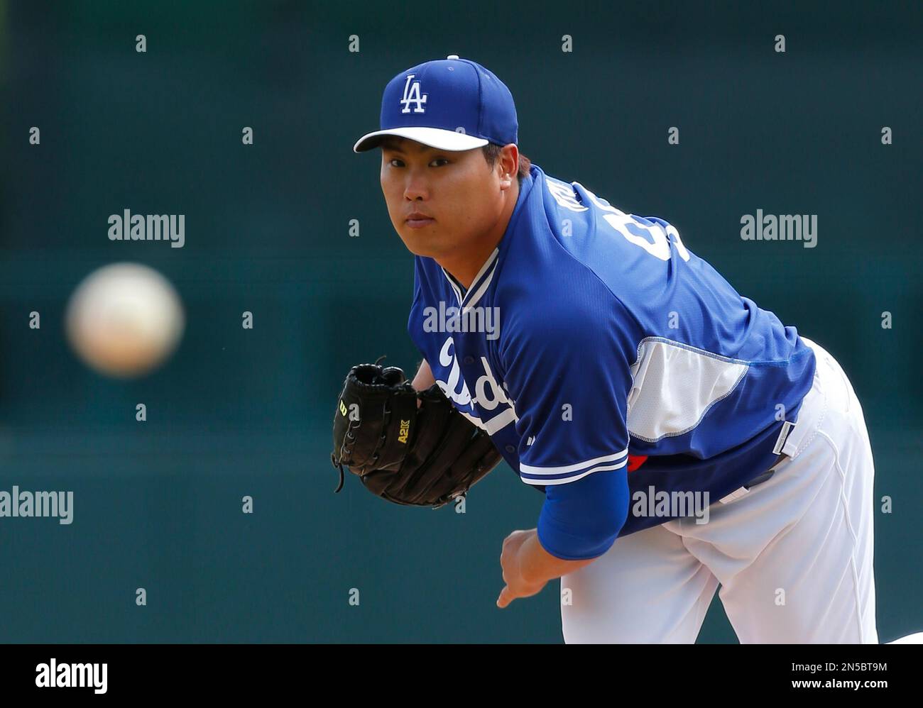 Los Angeles Dodgers pitcher Hyun-Jin Ryu, of South Korea, throws ...