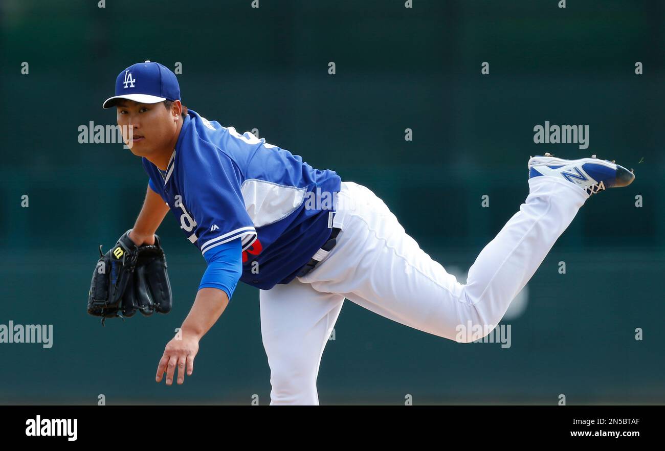 Los Angeles Dodgers pitcher Hyun-Jin Ryu, of South Korea, throws ...