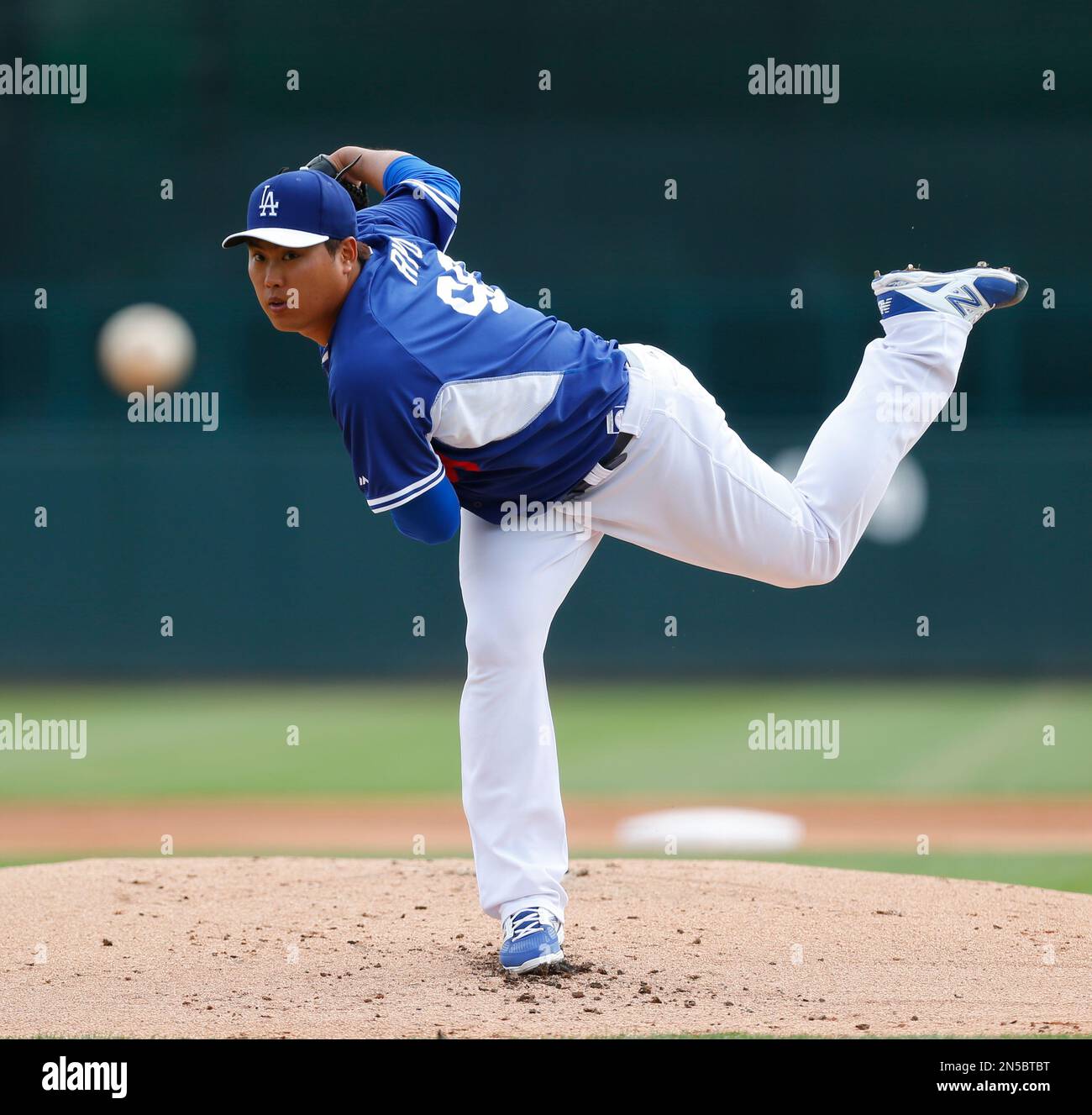 Los Angeles Dodgers pitcher Hyun-Jin Ryu, of South Korea, throws ...