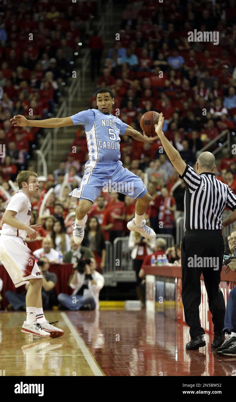 North Carolina's Marcus Paige (5) saves the ball from out-of-bounds as ...