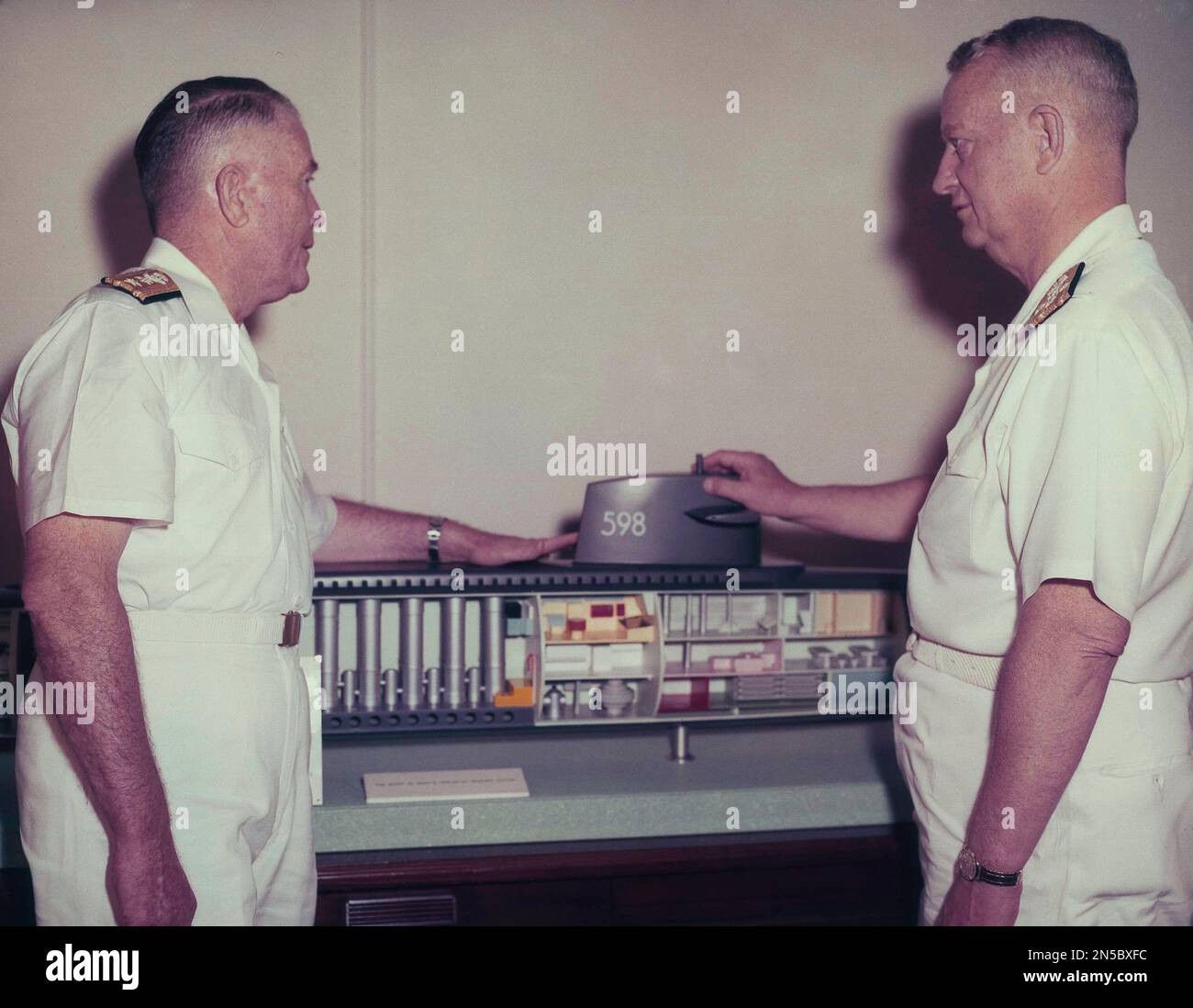 Rear Admiral William F. Raborn, U.S. Navy, left, director of the Navy's ...