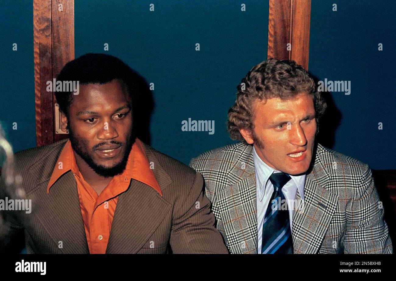 Joe Bugner, British heavyweight boxing champion, right, is pictured ...