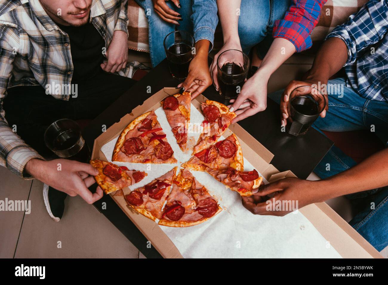 Friends have pizza party at home, fun leisure Stock Photo - Alamy
