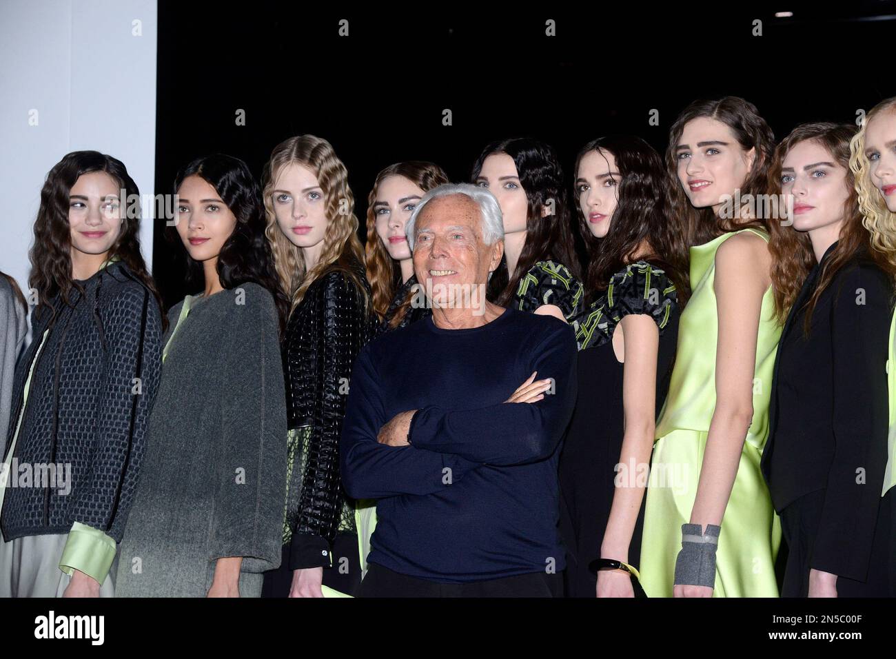 Italian fashion designer Giorgio Armani poses at the end of his women's ...