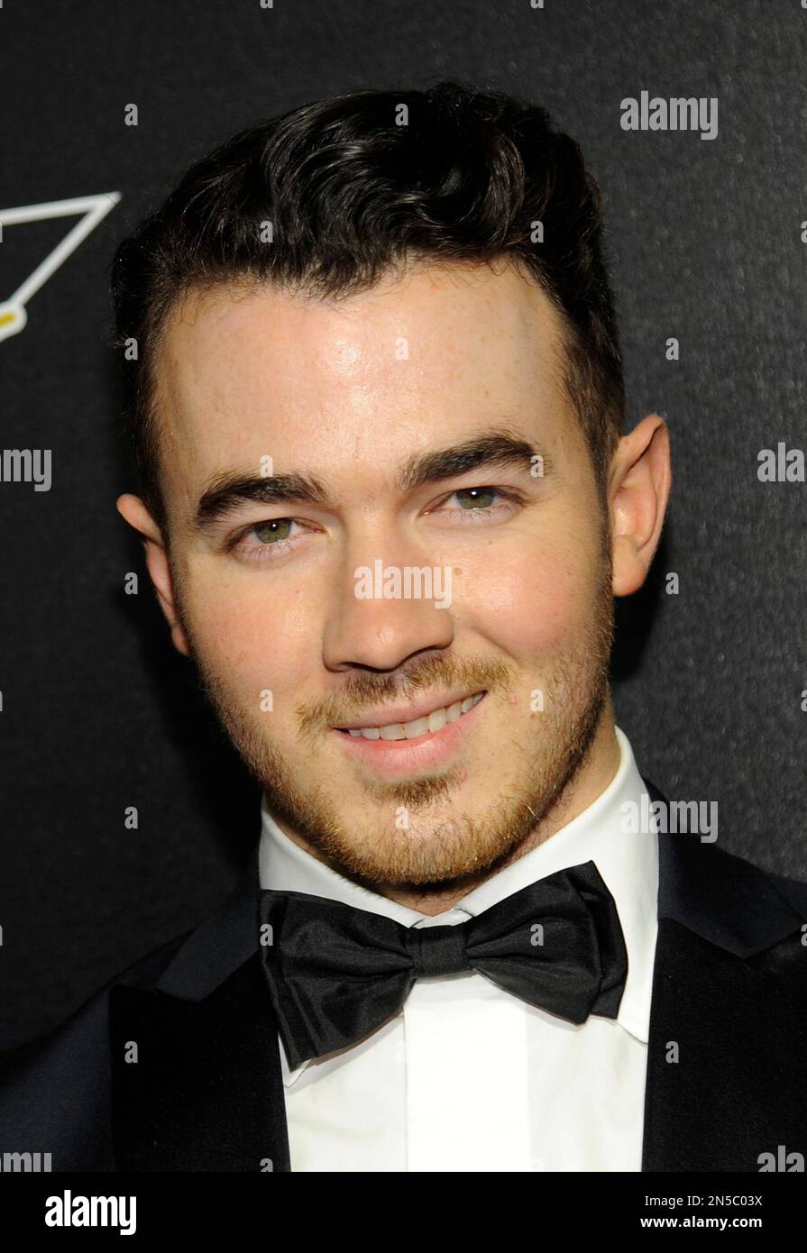 Event co-host Kevin Jonas poses at the Hollywood Domino & Bovet 1822 ...