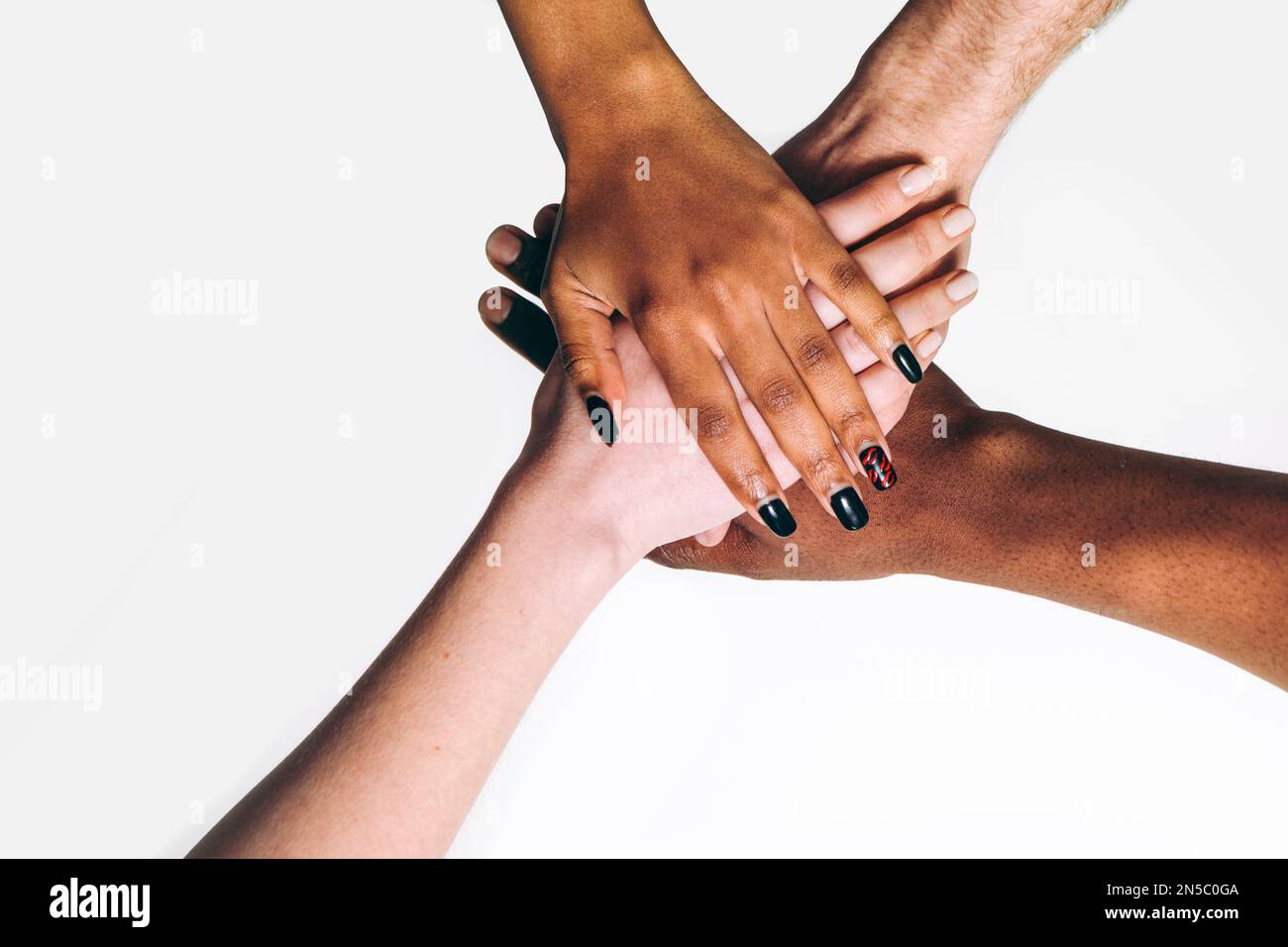 Black and white hands, international friendship Stock Photo - Alamy