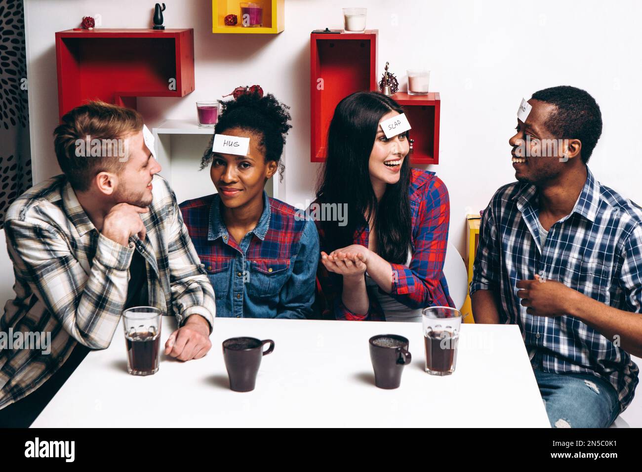 Friends play game who am I. Fun entertainment Stock Photo - Alamy