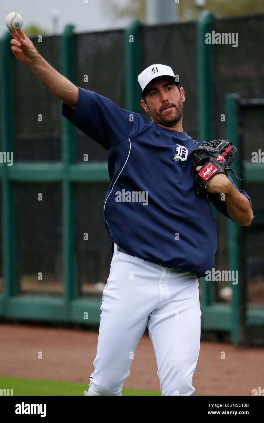 Detroit Tigers starting pitcher Justin Verlander warms up before an ...