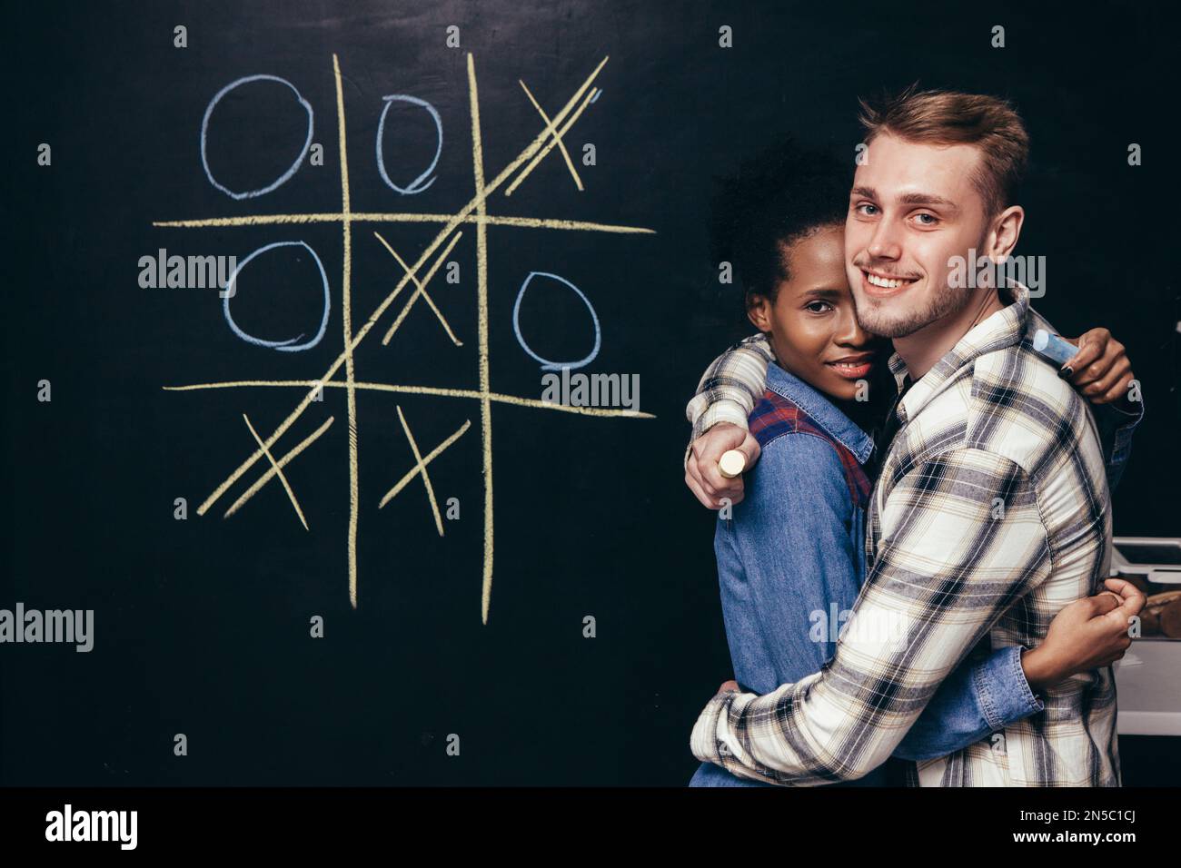 Happy hug interracial couple hi-res stock photography and images - Alamy