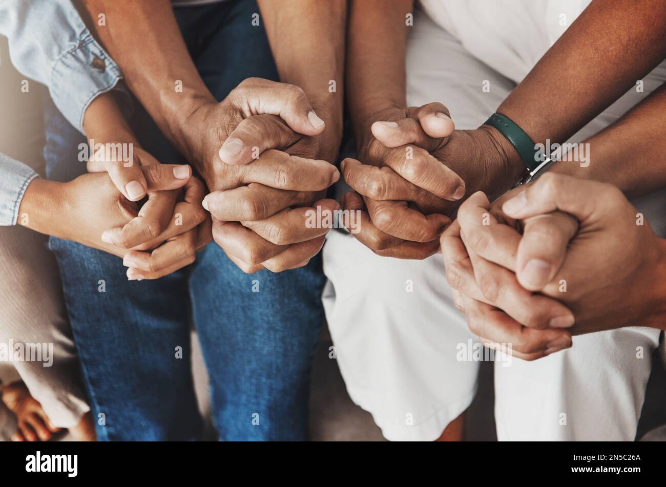 Family, hands and prayer in home for love, support and faith or hope in ...