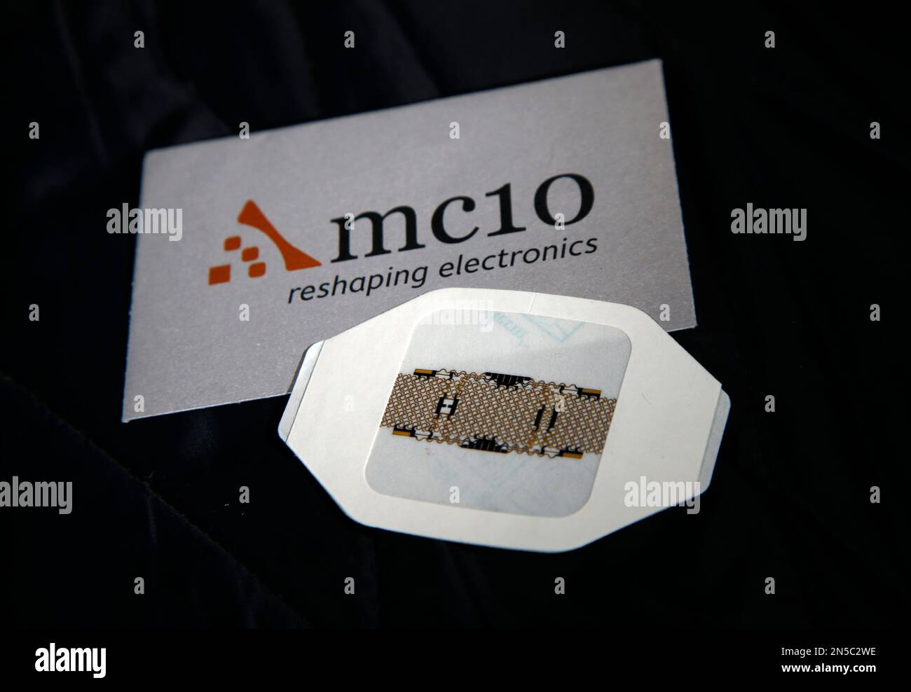 MC10's Biostamp, a seamless sensing sticker worn on an athlete's skin ...
