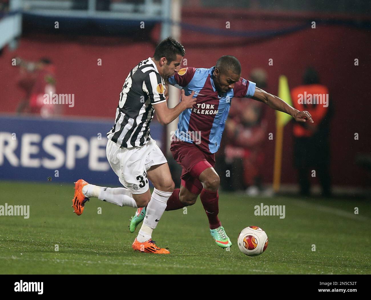 Trabzonspor's Florent Malouda, right, and Mauricio Isla of Juventus ...