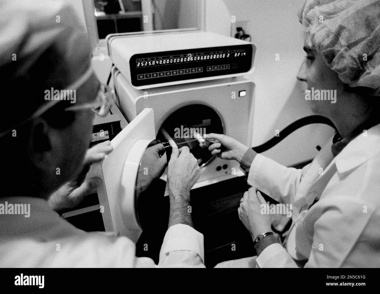 Dr. Ron Gallert, left, and Carol Zeigler, right, demonstrate the method ...