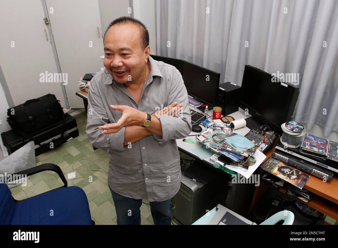 In this photo taken Monday, Feb. 17, 2014, Cambodian film director ...