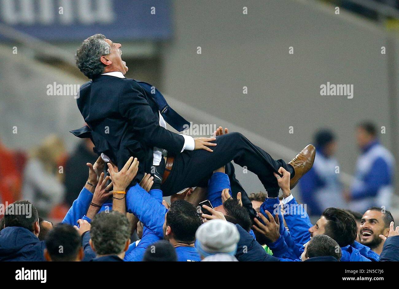 FILE - Fernando Santos, the coach of Greece is thrown into the air by ...