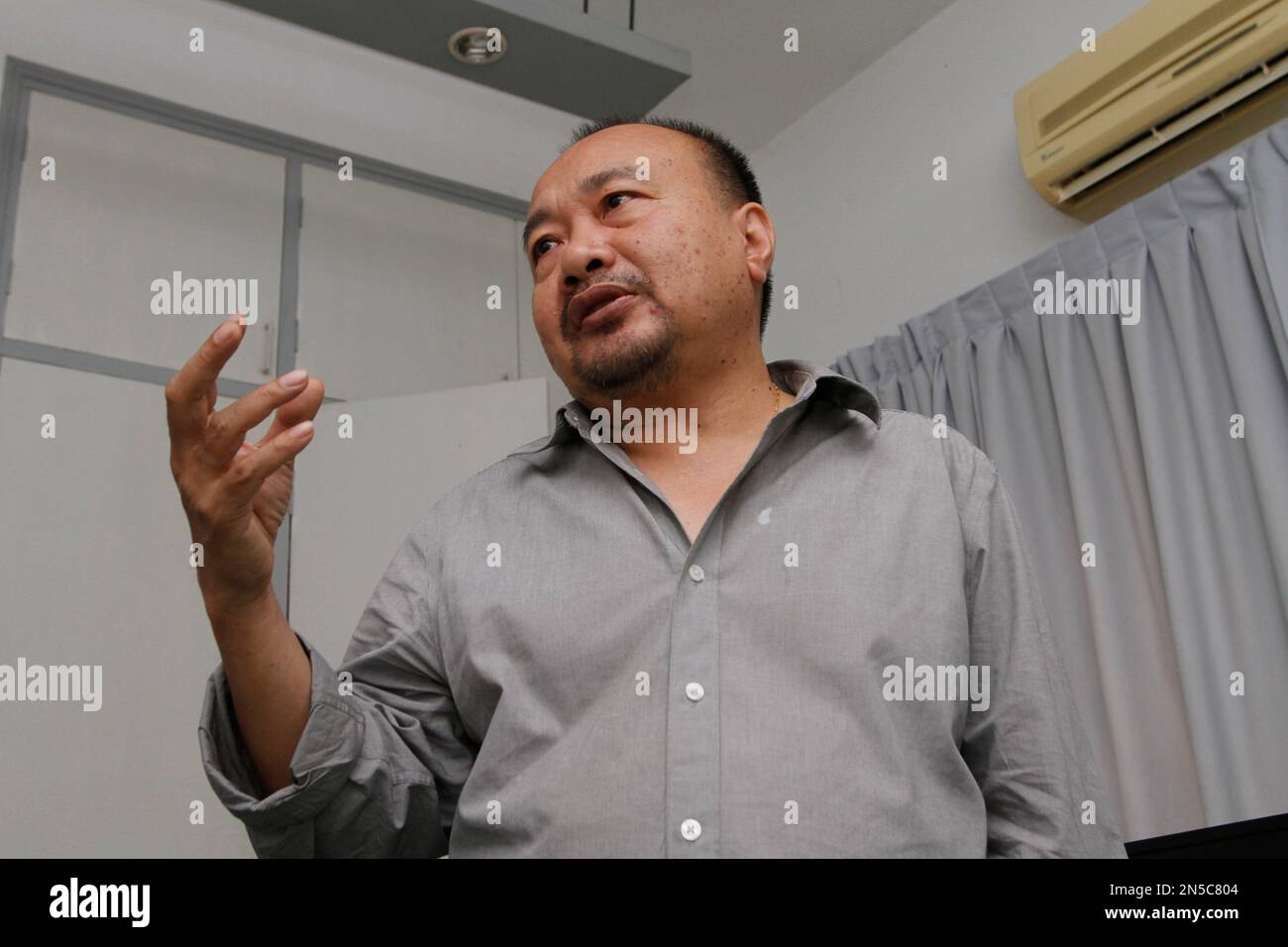 In this photo taken Monday, Feb. 17, 2014, Cambodian film director ...