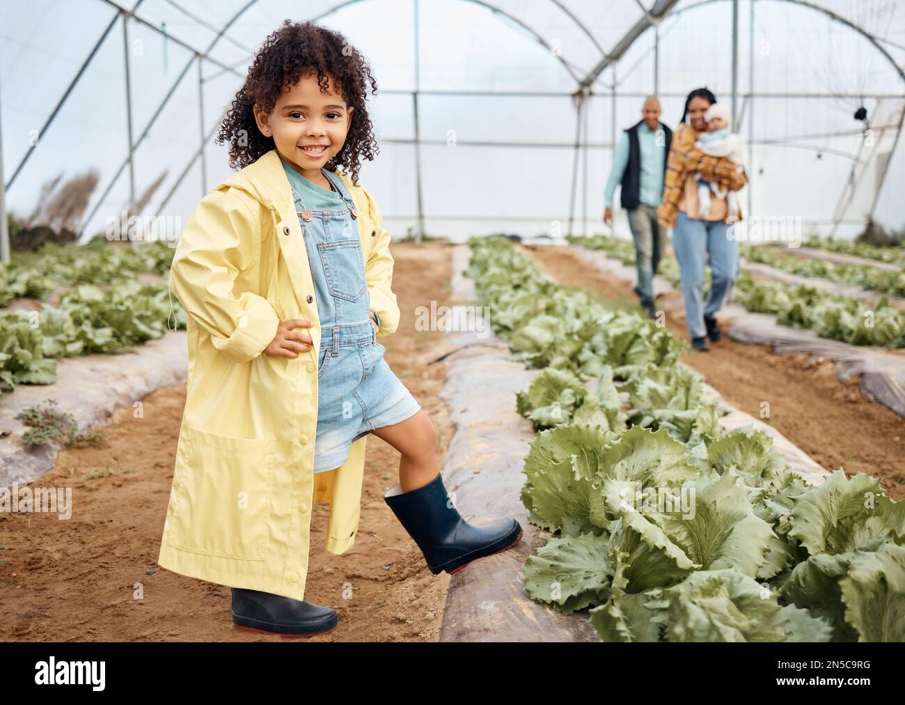 Kid, happy or girl in farming portrait, akimbo or hands on hips in ...