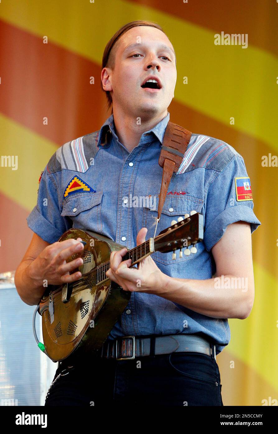 FILE - This May 6, 2011 file photo shows Arcade Fire lead singer Win ...