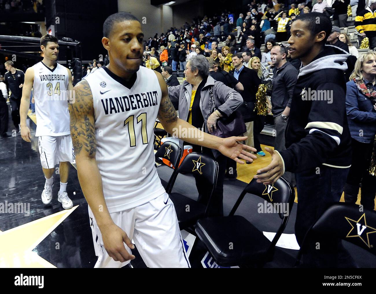 Vanderbilt guard Kyle Fuller (11) walks off the court after Florida ...