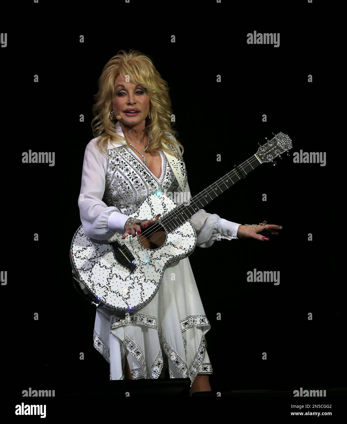 Dolly Parton performs on stage during her Blue Smoke tour in Sydney ...