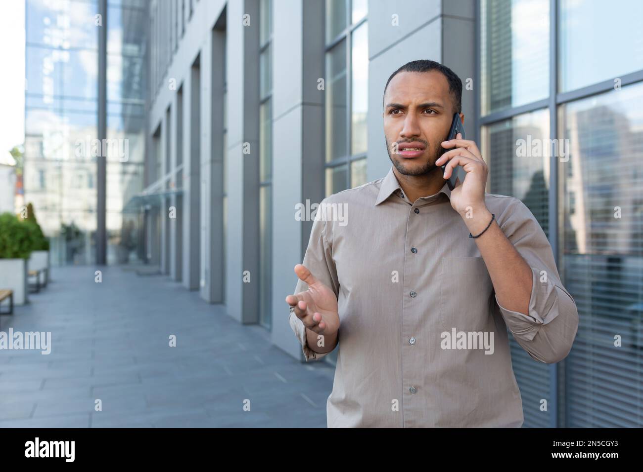 Outdoor portrait angry african businessman hi-res stock photography and ...