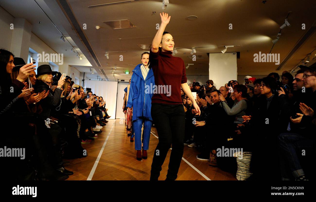 French fashion designer Christine Phung reacts after the presentation ...