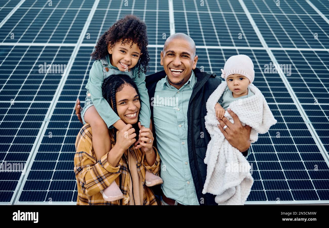 Black family, children or solar energy with parents and daughter ...