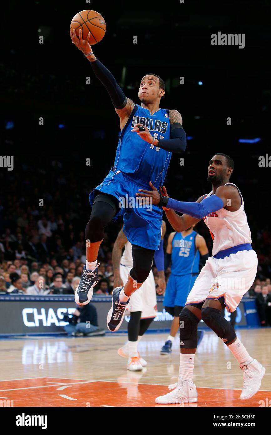 Dallas Mavericks' Monta Ellis (11) goes to the basket against New York Knicks' Tim Hardaway, Jr ...
