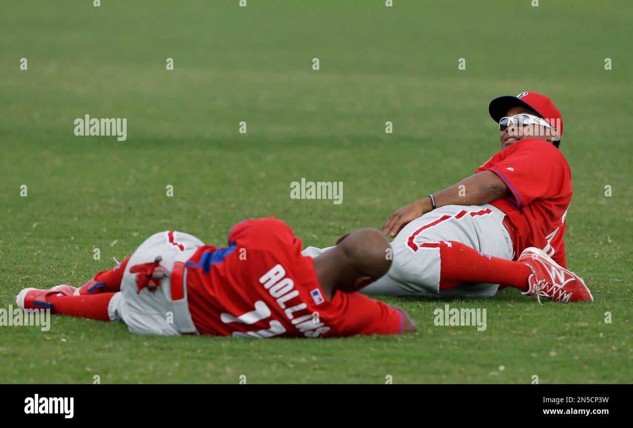Philadelphia Phillies outfielder Marlon Byrd, right, talks with ...