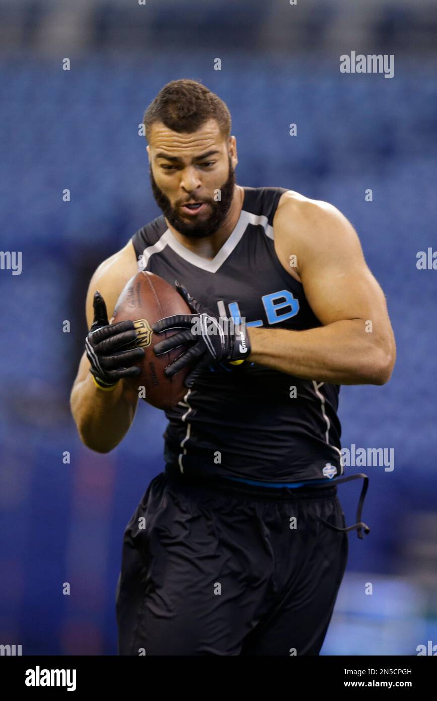 Brigham Young linebacker Kyle Van Noy runs a drill at the NFL football scouting combine in ...