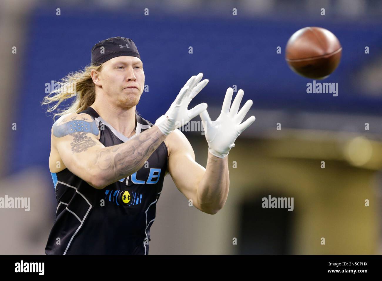 South Dakota linebacker Tyler Starr runs a drill at the NFL football ...