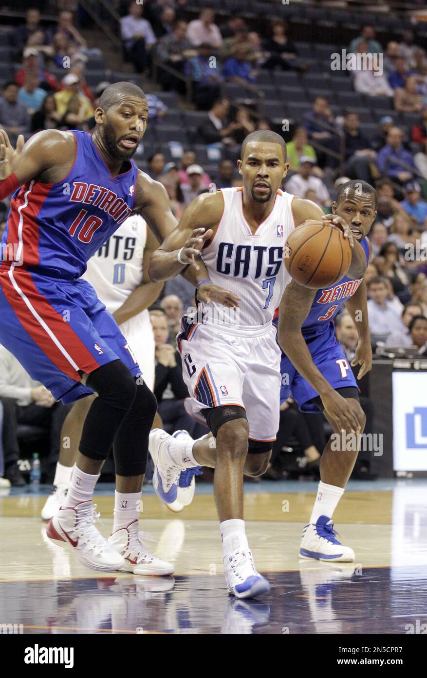 Charlotte Bobcats' Ramon Sessions (7) gathers up a loose ball from ...