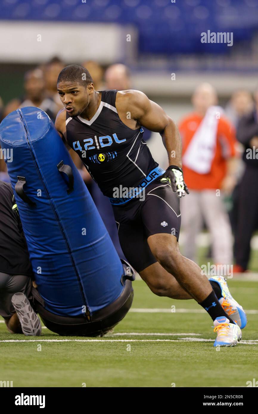 Missouri defensive lineman Michael Sam runs a drill at the NFL football ...