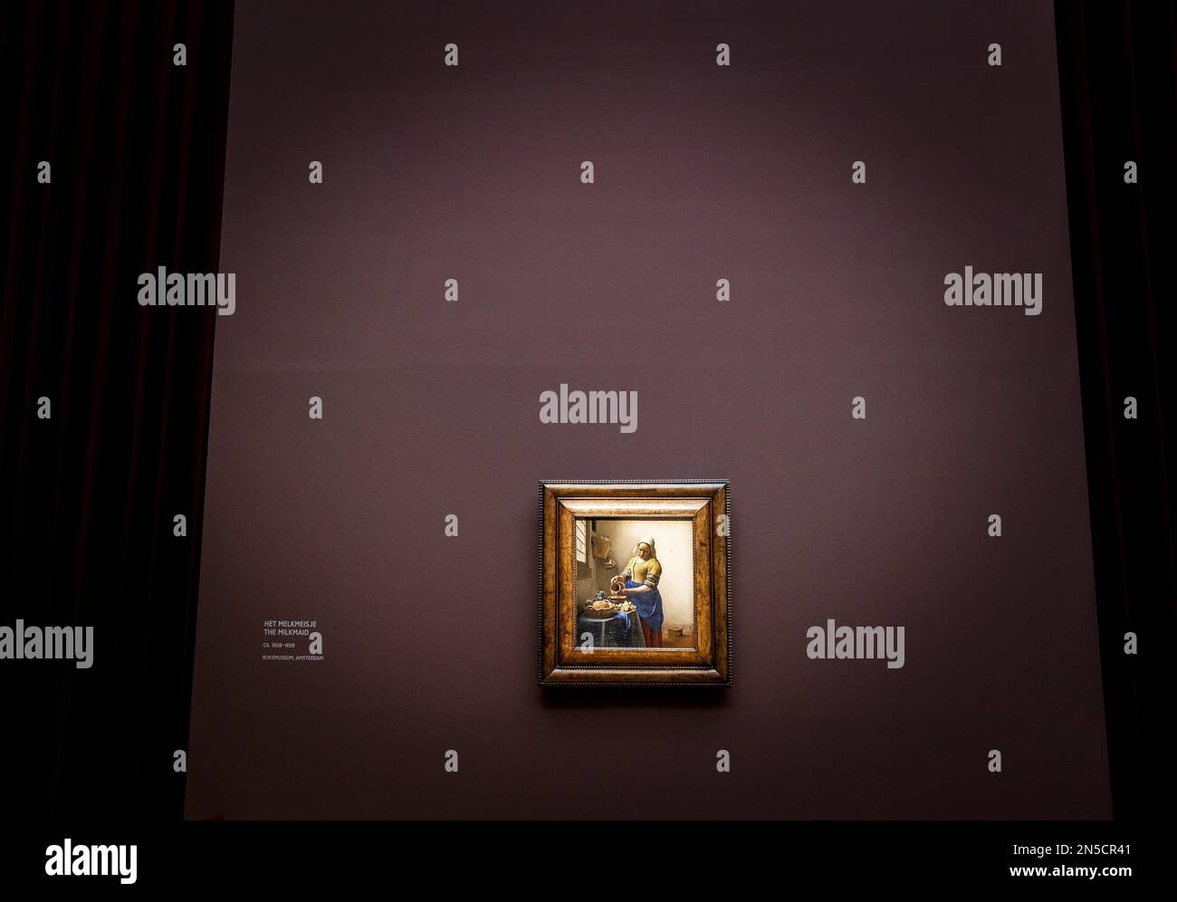 AMSTERDAM - The painting The Milkmaid by Johannes Vermeer during the ...