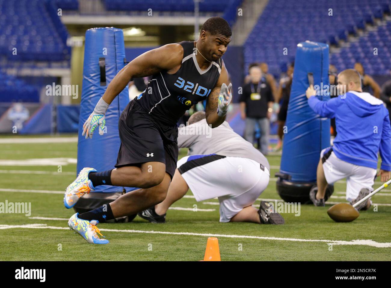 South Florida defensive lineman Tevin Mims runs a drill at the NFL ...