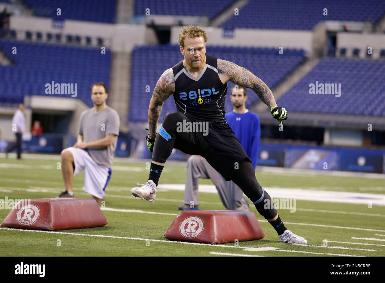 UCLA defensive lineman Cassius Marsh runs a drill at the NFL football ...