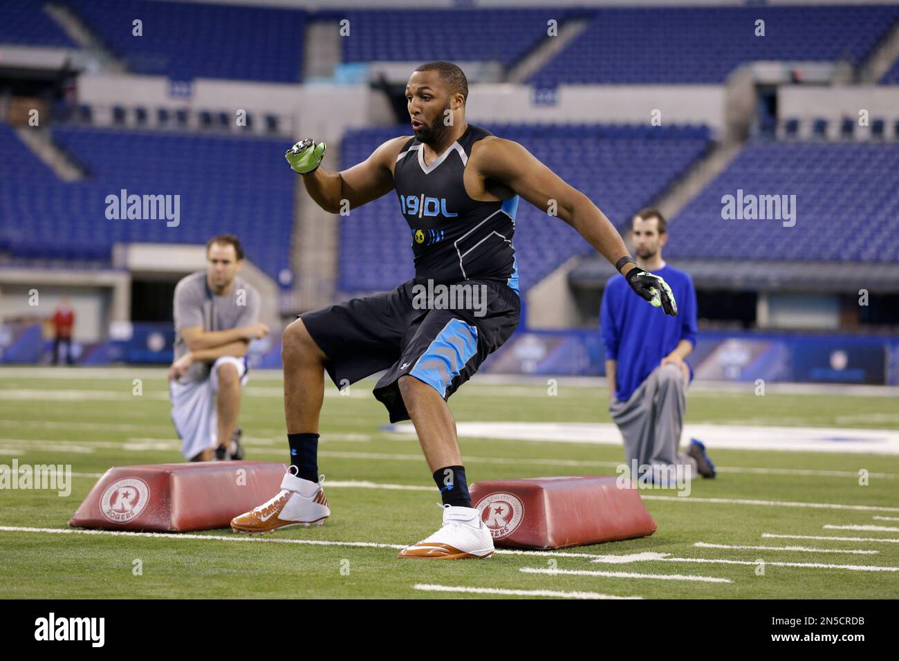 Texas defensive lineman Jackson Jeffcoat runs a drill at the NFL ...