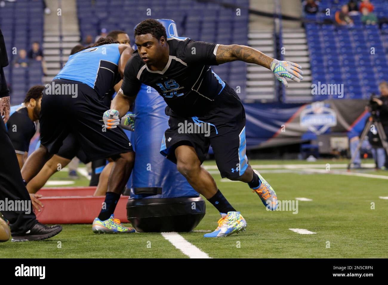 Texas Tech defensive lineman Kerry Hyder runs a drill at the NFL ...