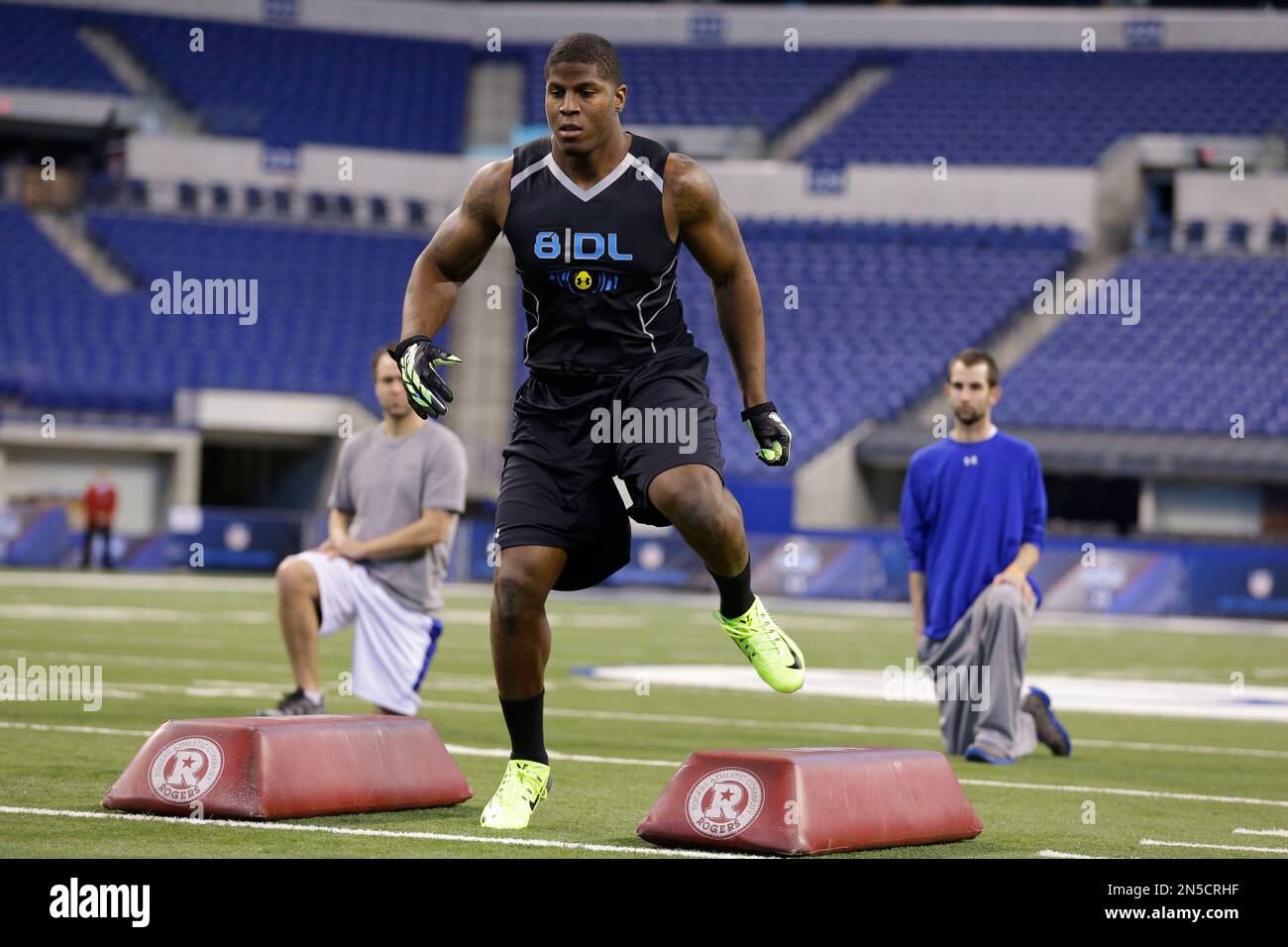 Missouri defensive lineman Kony Ealy runs a drill at the NFL football ...