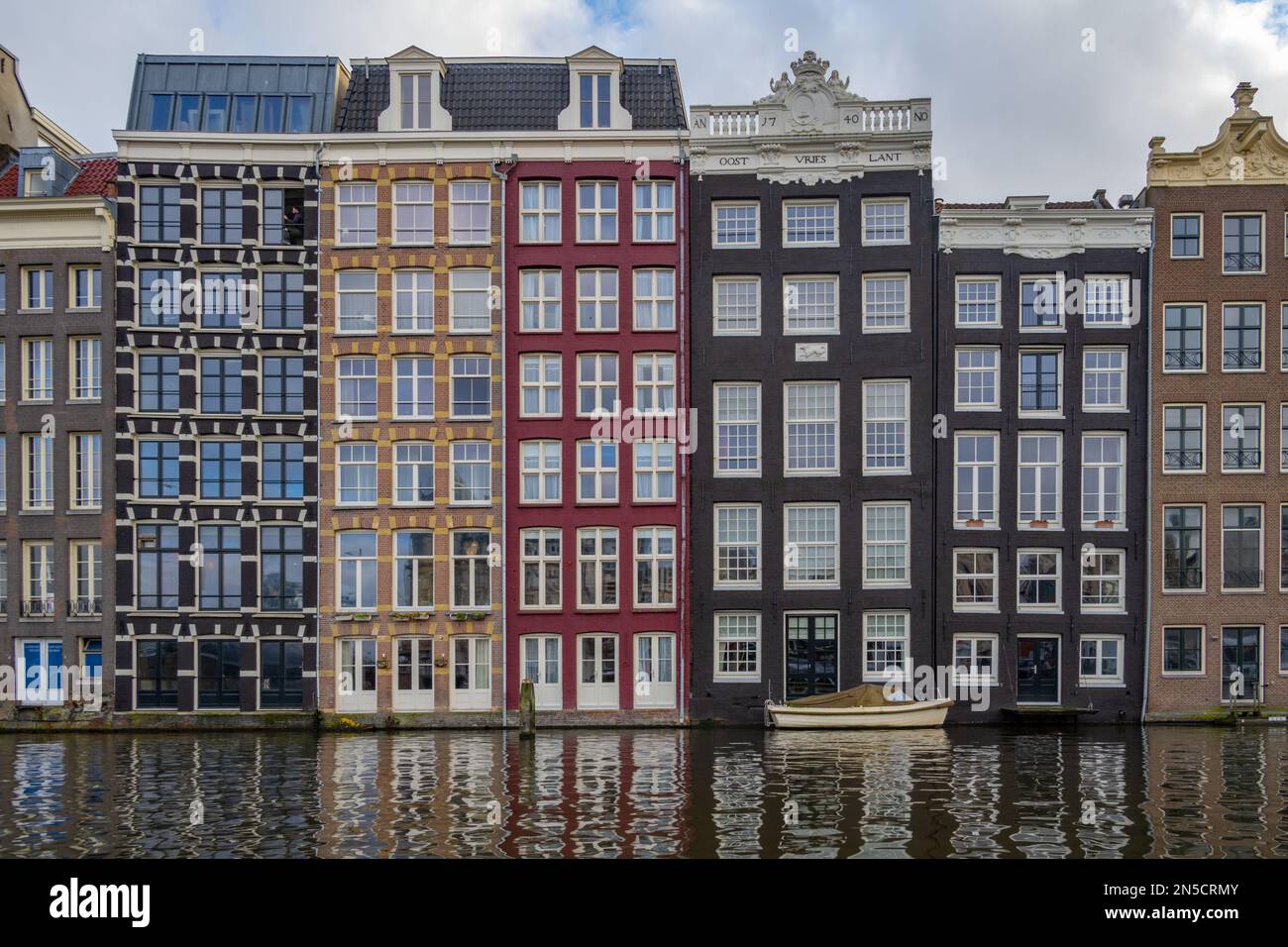 Traditional buildings around the Damrak, Amsterdam Netherlands Stock ... Traditional buildings around the Damrak, Amsterdam Netherlands Stock ...