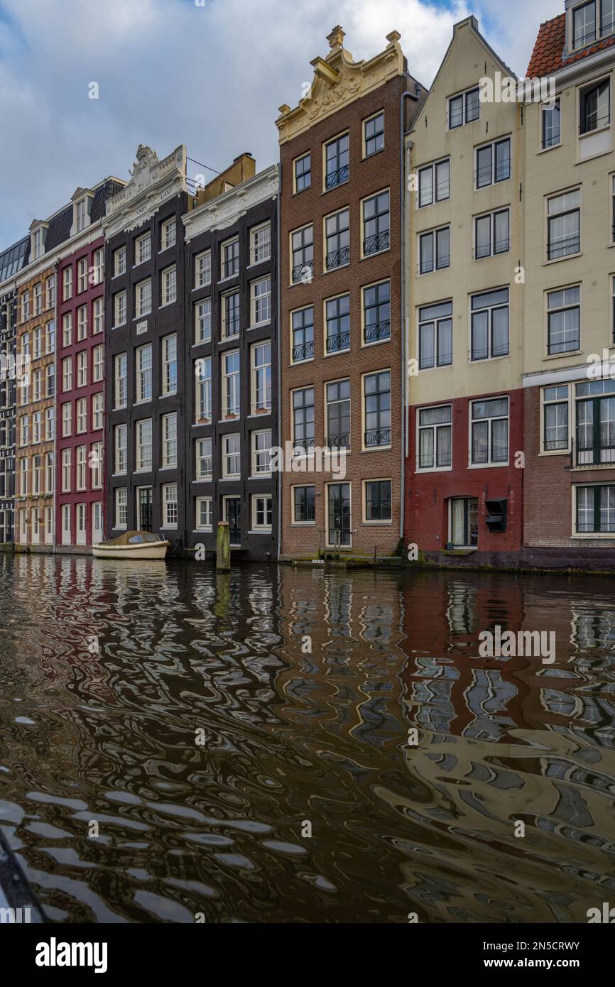 Traditional buildings around the Damrak, Amsterdam Netherlands Stock ... Traditional buildings around the Damrak, Amsterdam Netherlands Stock ...
