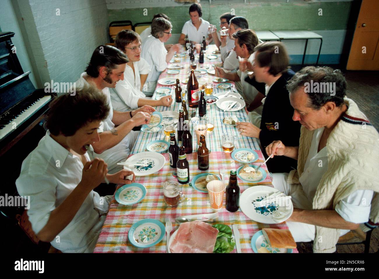 Local village cricket team eating lunch in Wiltshire, 1978 Stock Photo ...